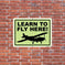 Learn to Fly Here Sign or Sticker | VictoryStore – VictoryStore.com